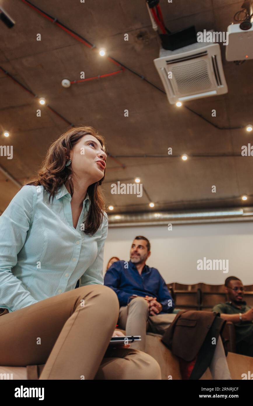 Impatient female employee explaining exciting opportunity to her ...