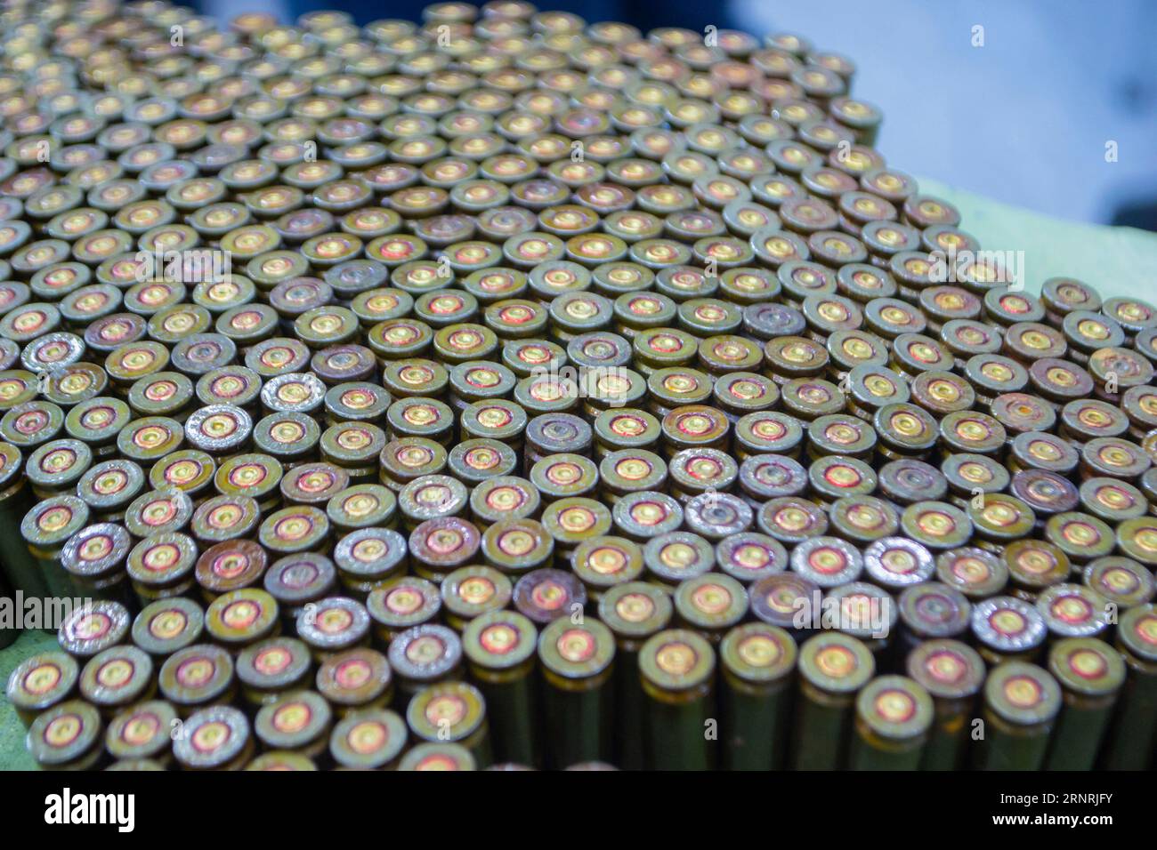 Object made up of spent used cartridge cases. Lots used shells from ...