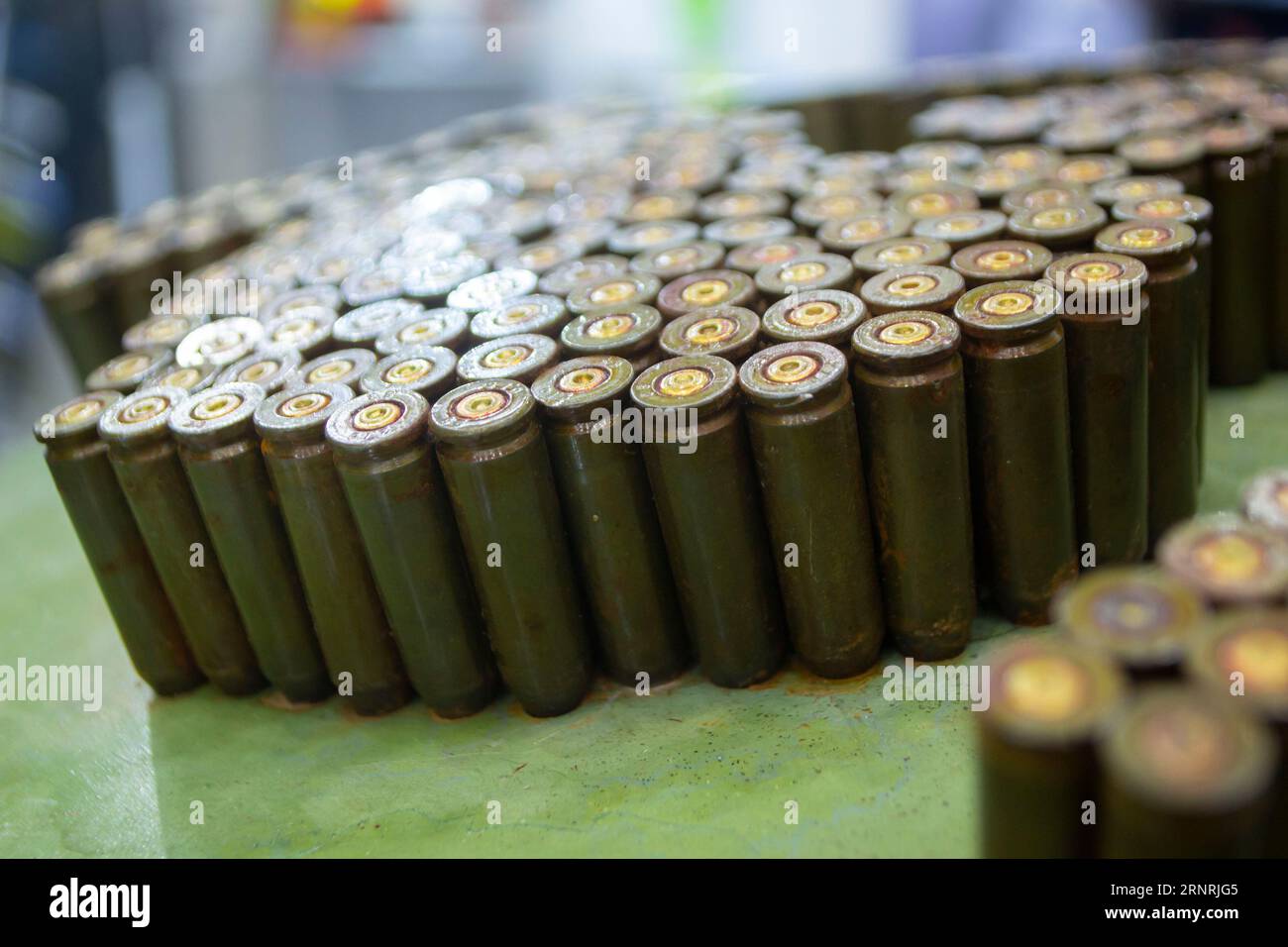 Object made up of spent used cartridge cases. Lots used shells from ...