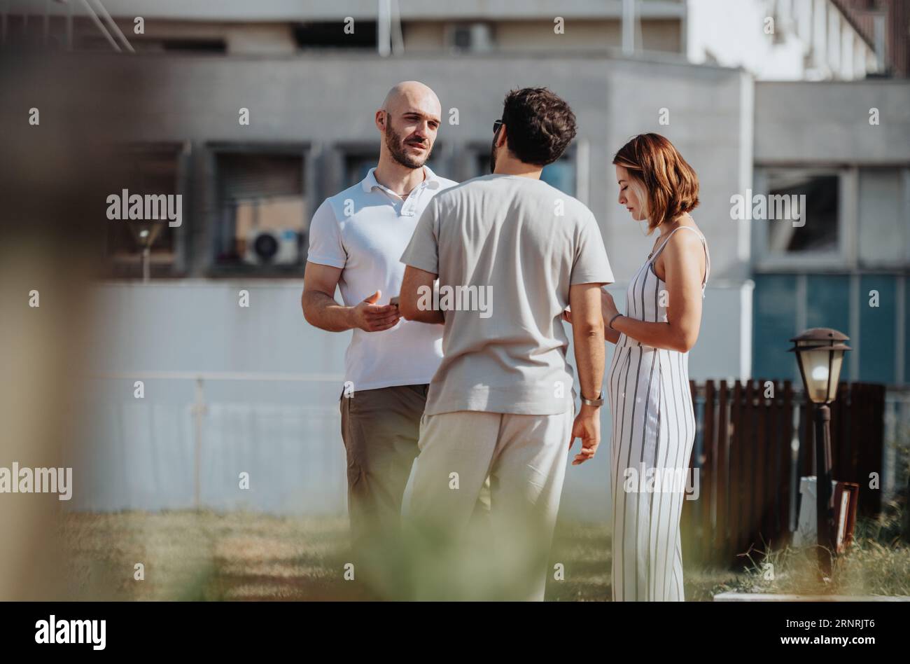 Aesthetic architects collaborating on blueprint for modernized building ...