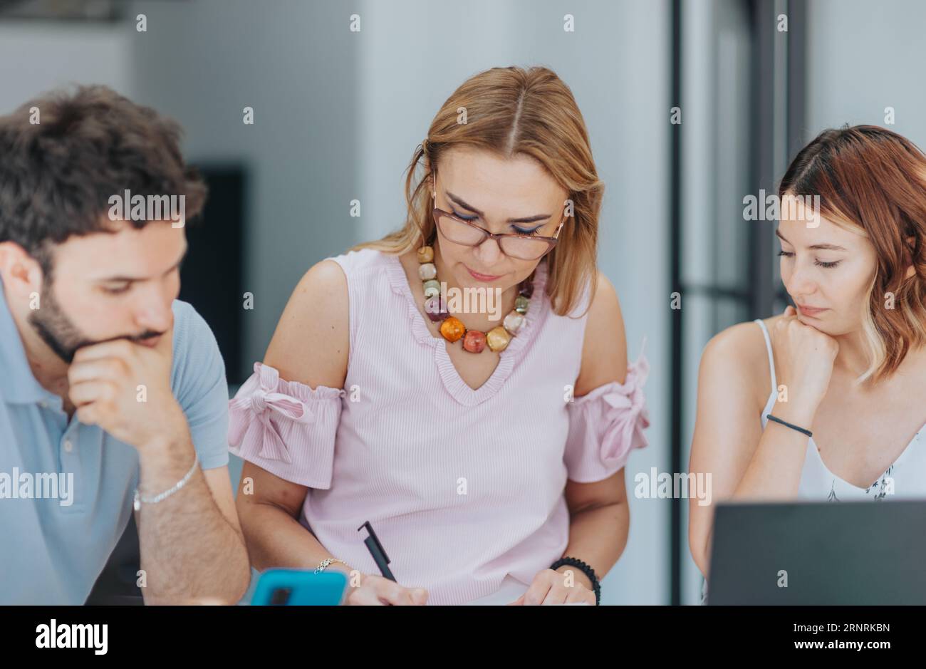 Successful Marketing Team working Together in Modern Office Room Stock ...