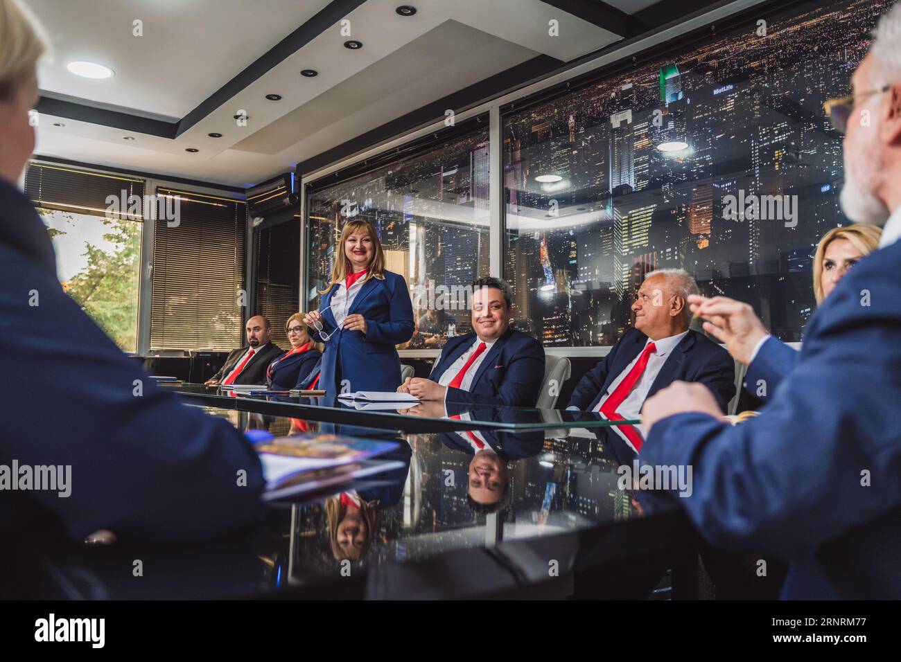 University rector having fun conversation with his professors during ...