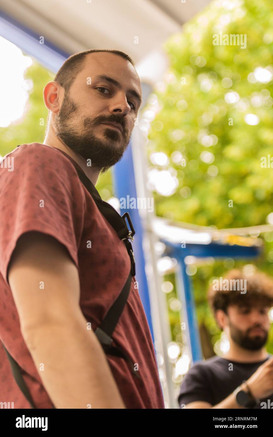 Male standing looking away chest hi-res stock photography and images ...