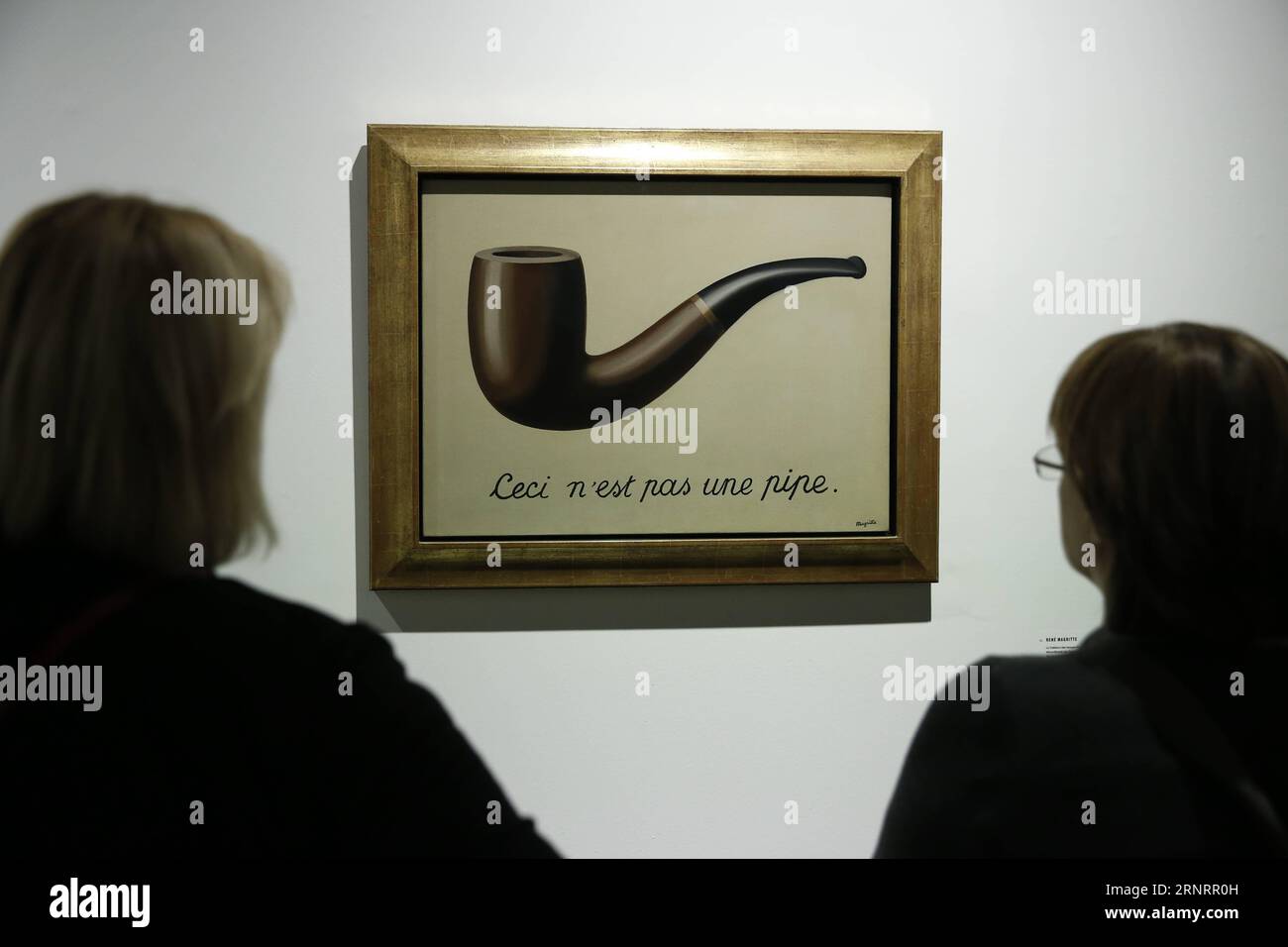 Rene magritte treachery of images hi-res stock photography and images ...