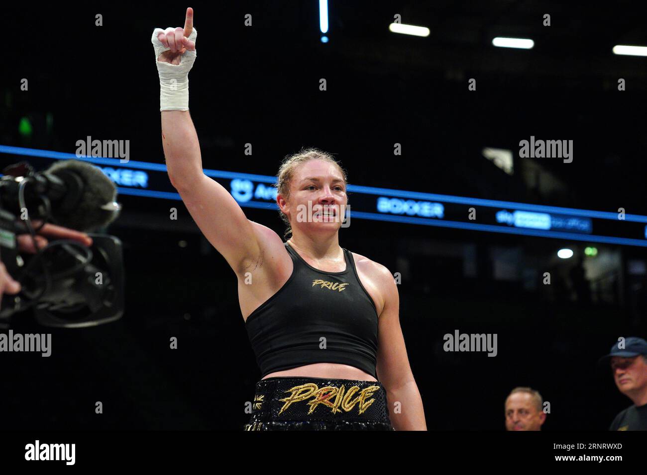 Lauren Price celebrates victory against Lolita Muzeya in the ...
