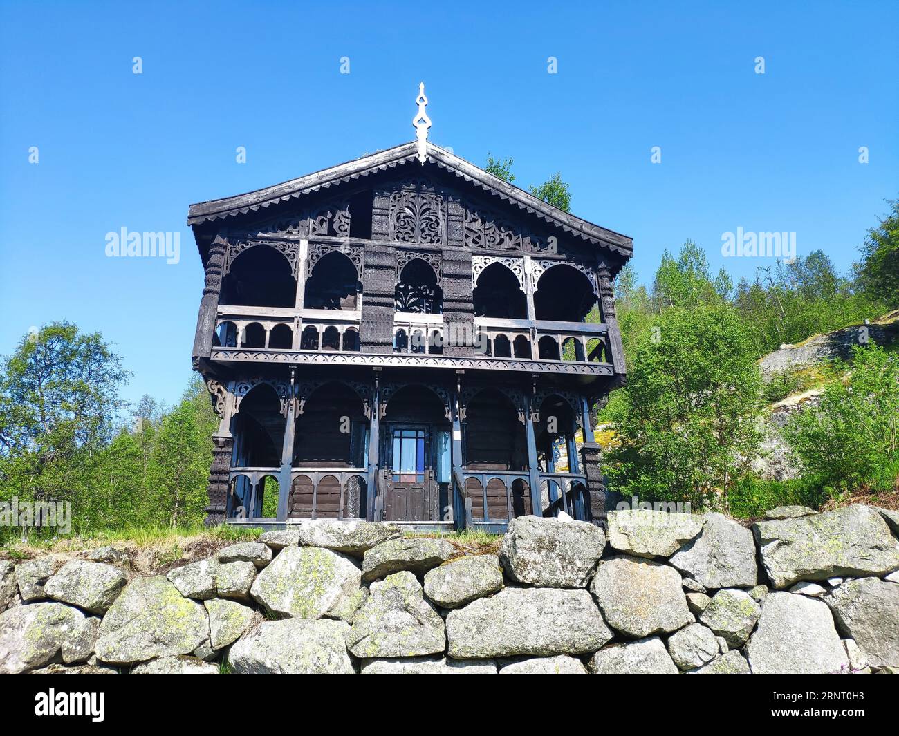 Old granary, Botn, Telemark, Norway. Meadow, grass, blue sky, village ...