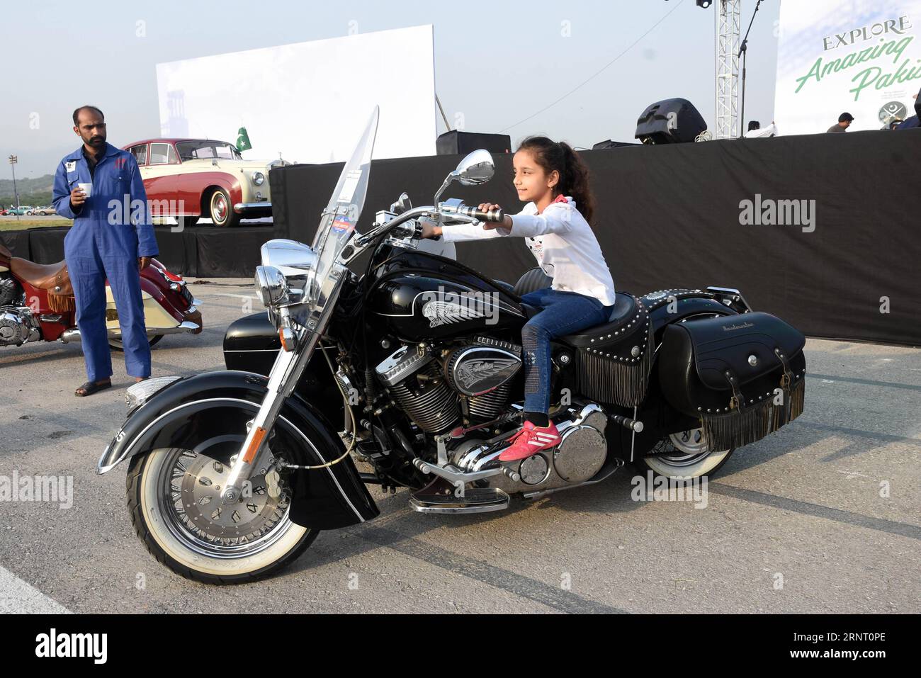 (171024) -- ISLAMABAD, Oct. 24, 2017 -- A girl sits on a motorbike ...