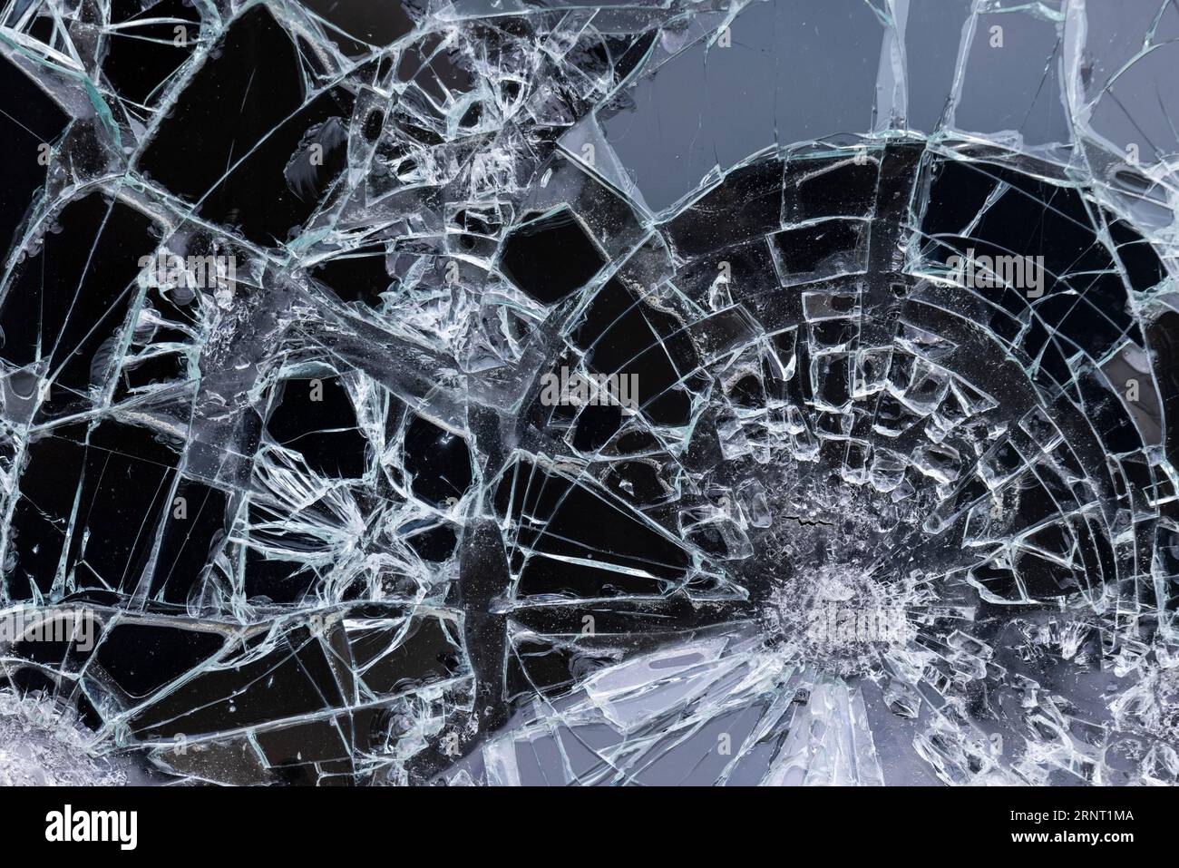 Pattern of smashed window pane, glass is splintered, window pane broken ...