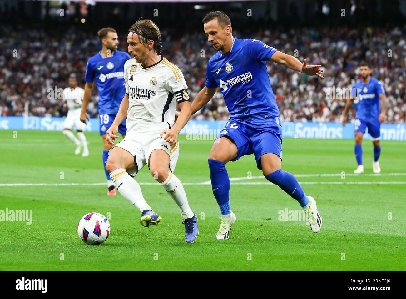 Real Madrid´s Luka Modri?? (L) and Getafe´s Maksimovi?? (R) in action ...