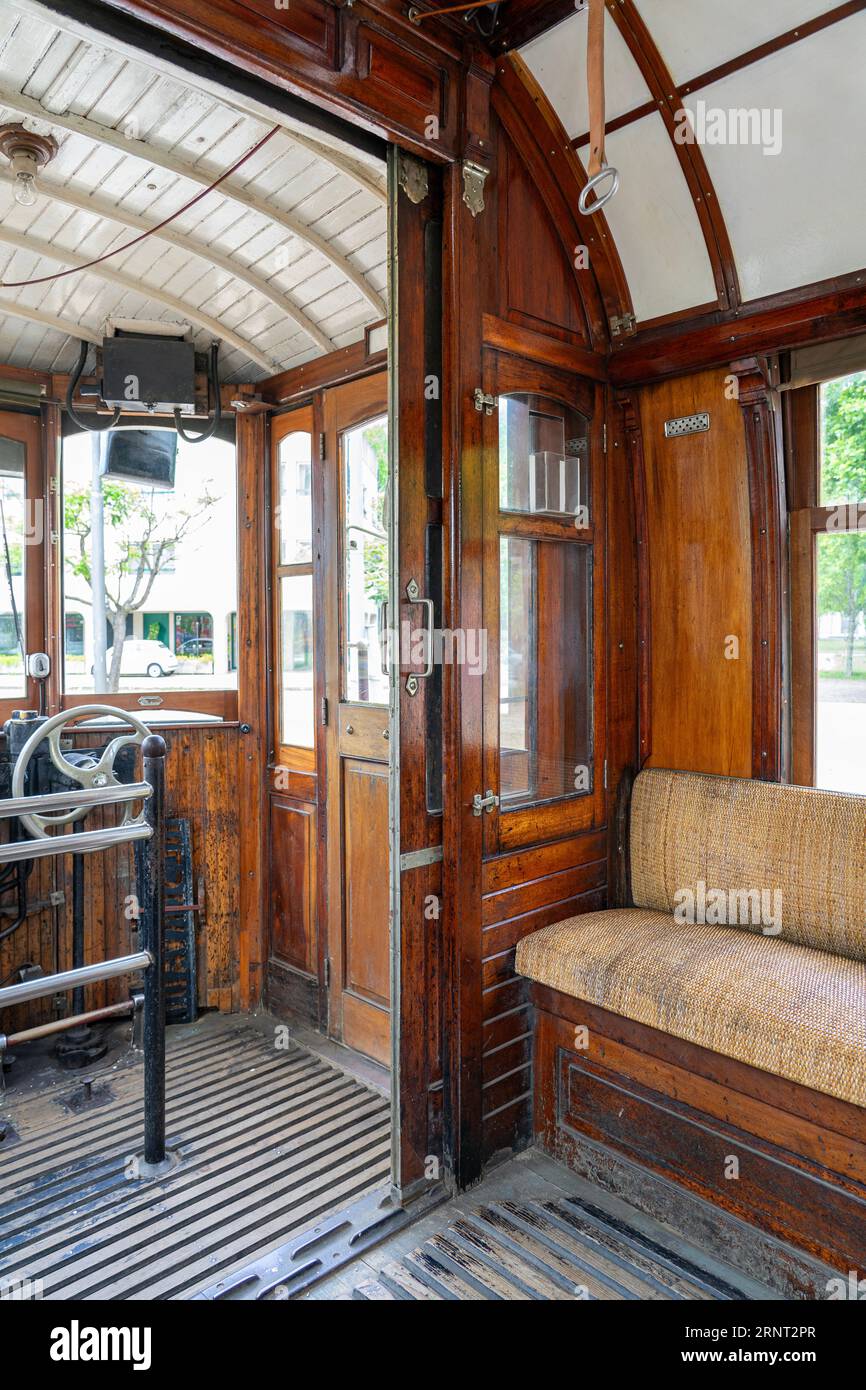 inside of a traditional tram red color in Porto Stock Photo - Alamy