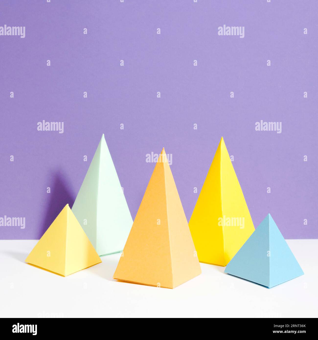 Colorful triangle paper collection Stock Photo - Alamy
