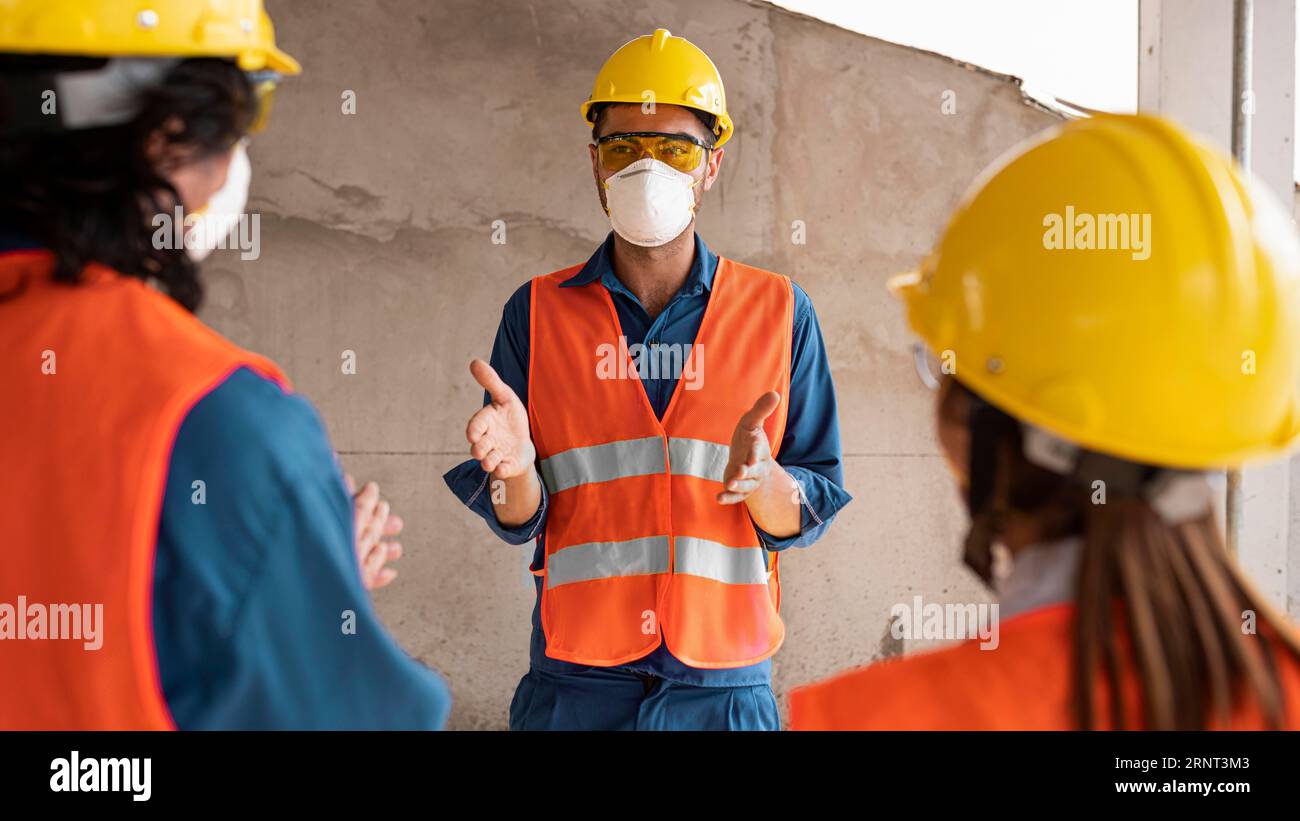 Employees with safety equipment Stock Photo - Alamy