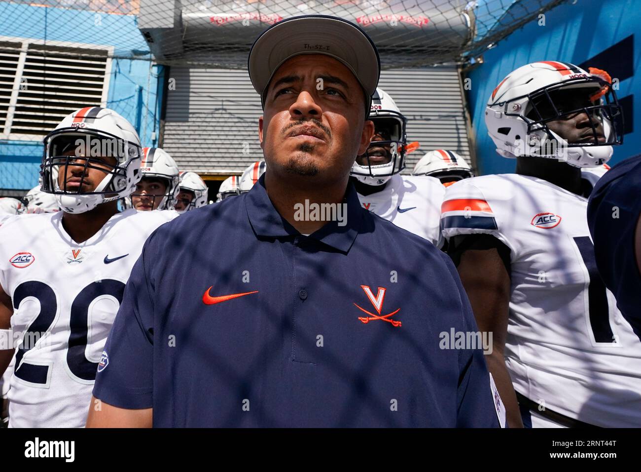 Virginia head coach Tony Elliott waits with his players to take the ...