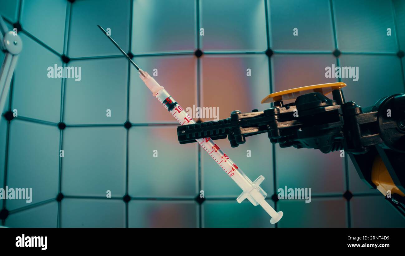 the robot holds a medical syringe concept the use of robotics in ...