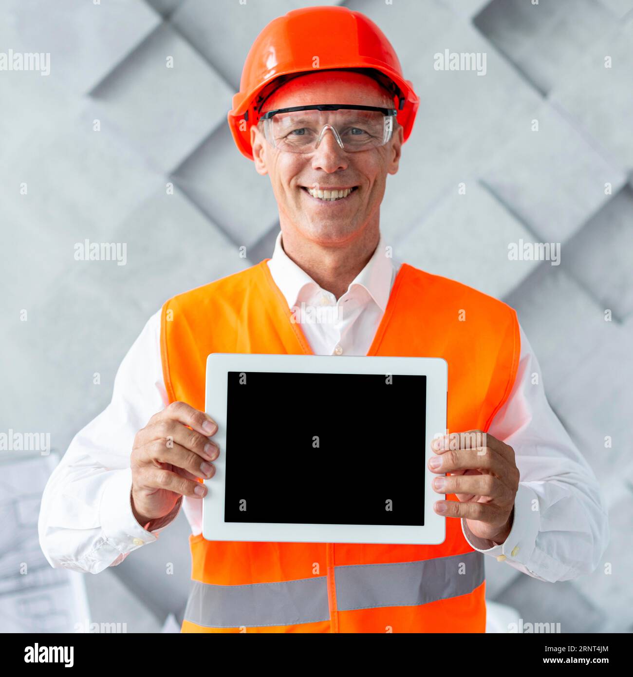 Man safety equipment showing tablet mock up Stock Photo - Alamy