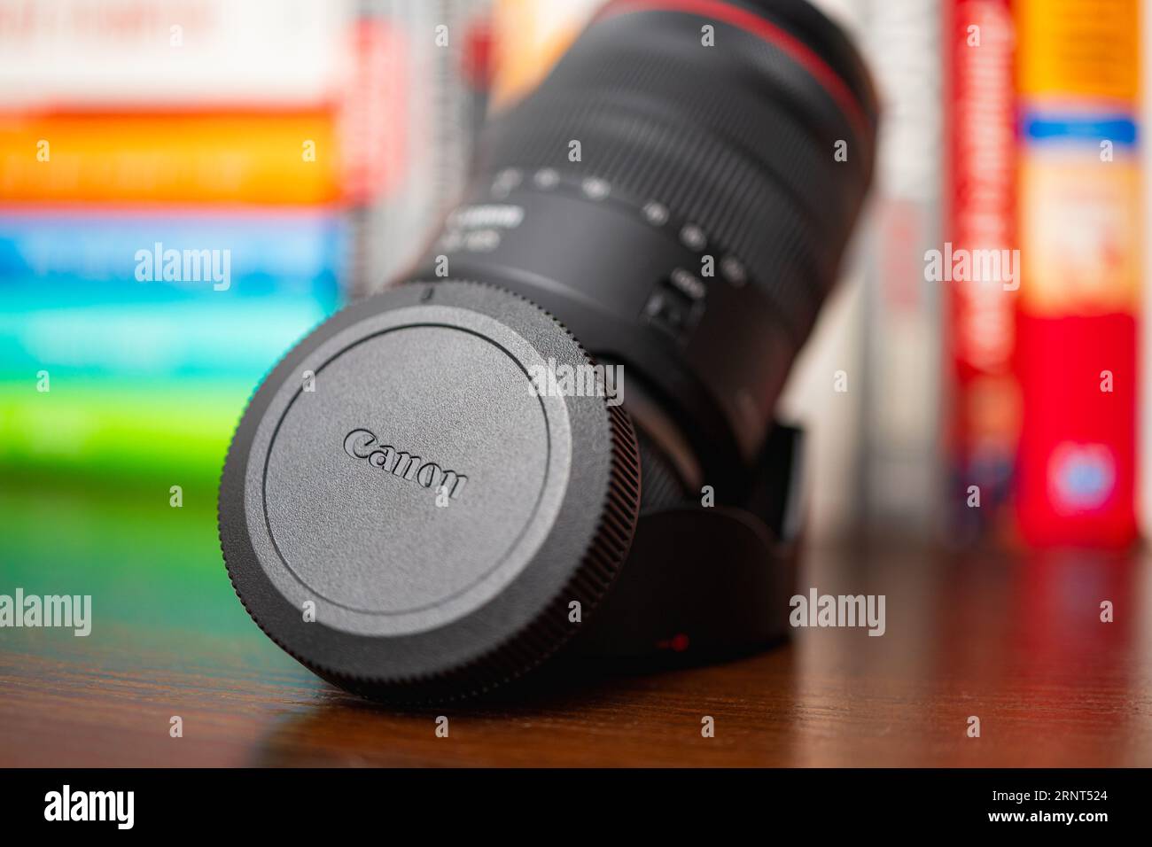 Wroclaw, Poland - May 17 2023: Camera lens cap of Canon RF lens next to ...