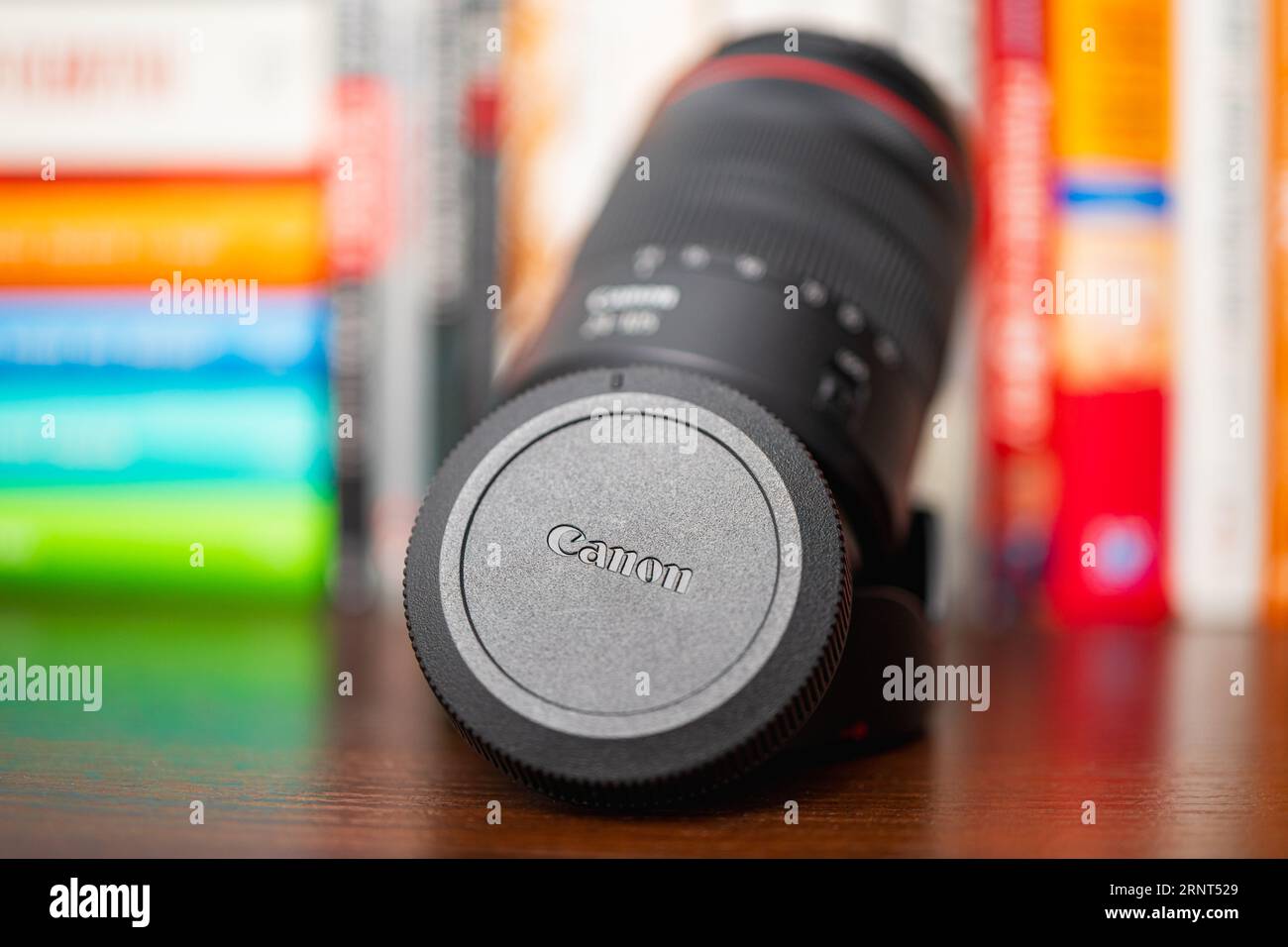 Wroclaw, Poland - May 17 2023: Camera lens cap of Canon RF lens next to ...