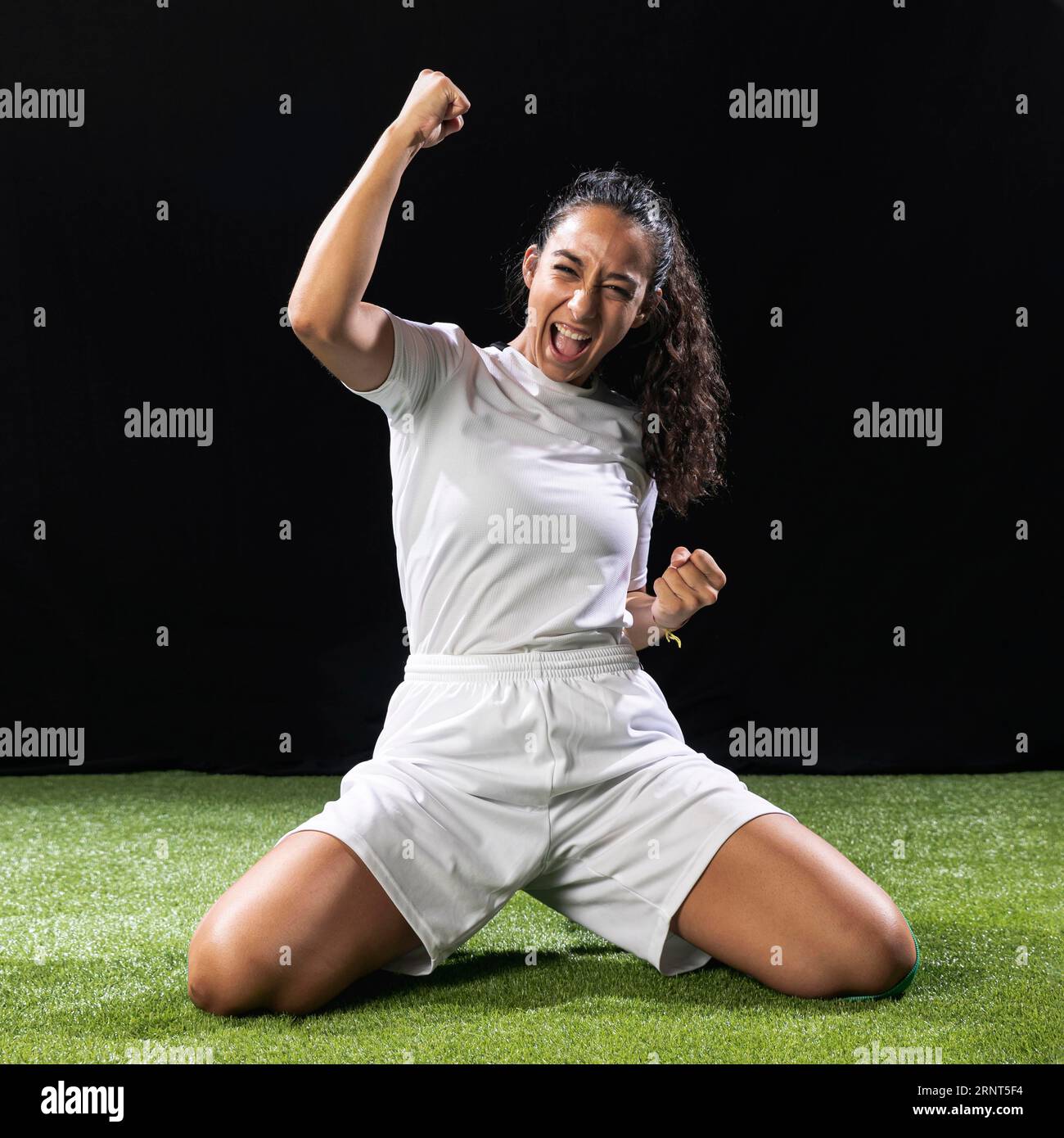 Happy female model celebrating hi-res stock photography and images - Alamy