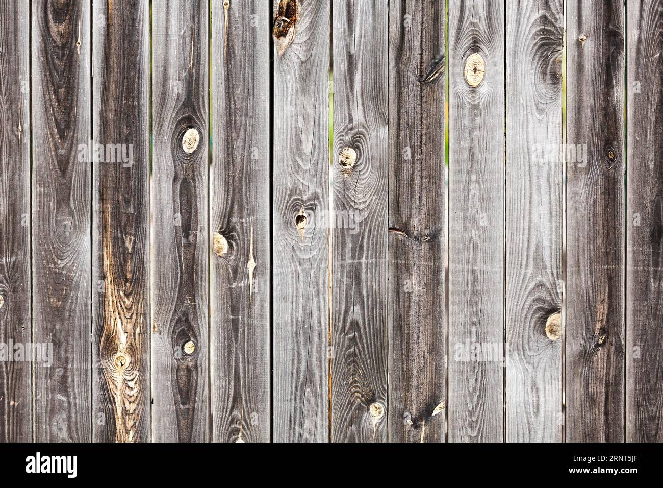 Old vintage planked wood board with holes Stock Photo - Alamy