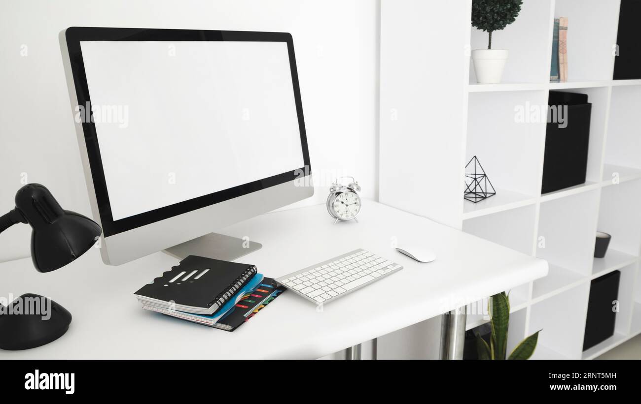 Office desk with computer screen Stock Photo - Alamy