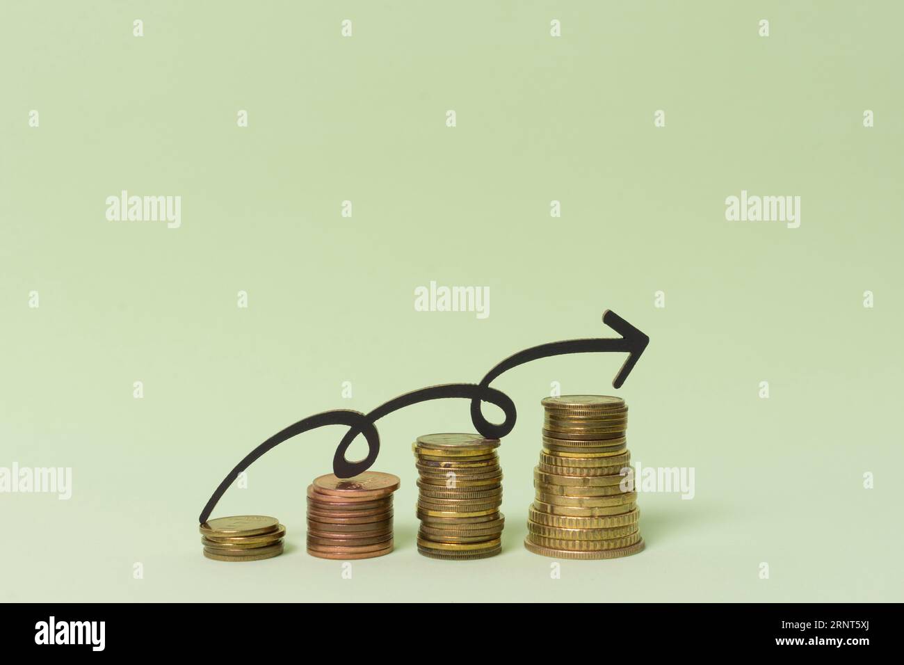 Coin with arrow hi-res stock photography and images - Alamy