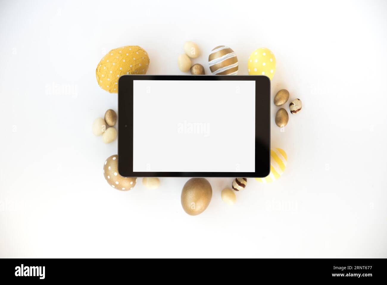 Tablet with blank screen easter eggs Stock Photo - Alamy