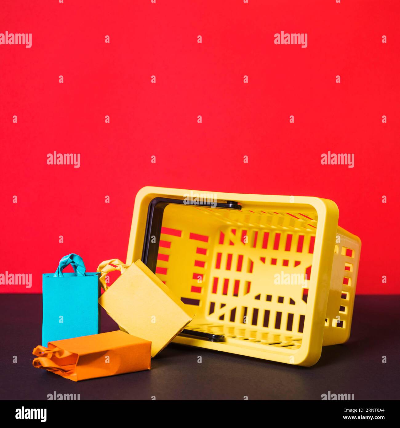 Shopping basket with toy packets Stock Photo - Alamy