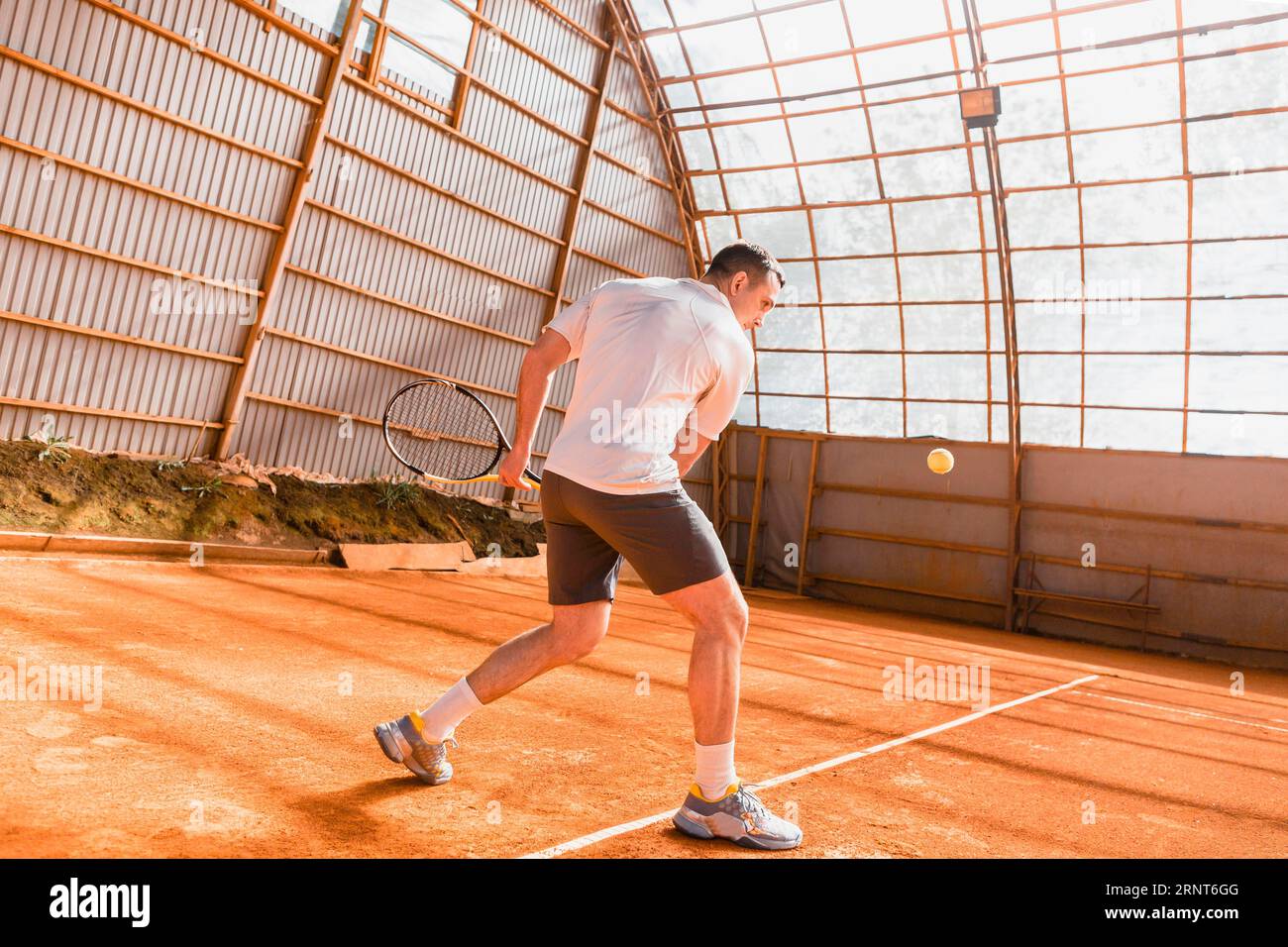 Tennis player motion Stock Photo - Alamy