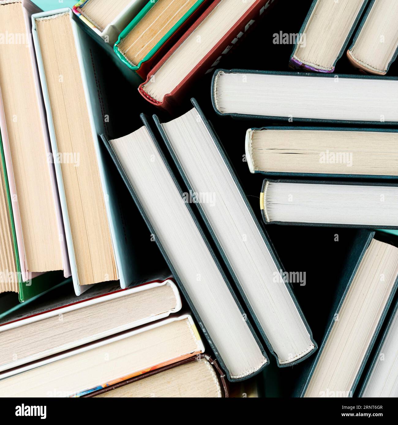 Top view books with black background Stock Photo - Alamy