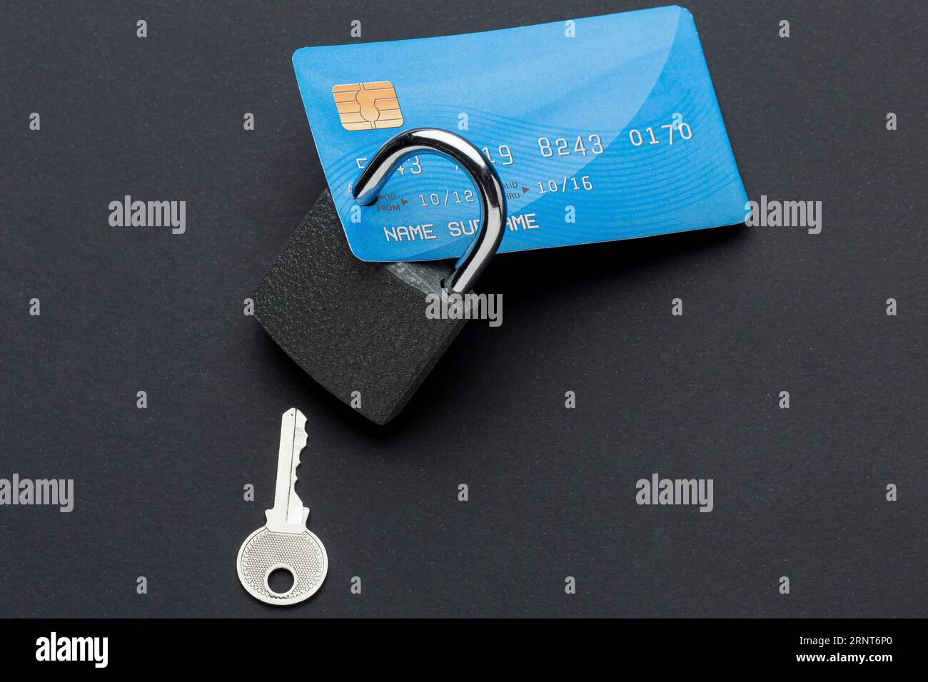 Top view credit card with lock key Stock Photo - Alamy