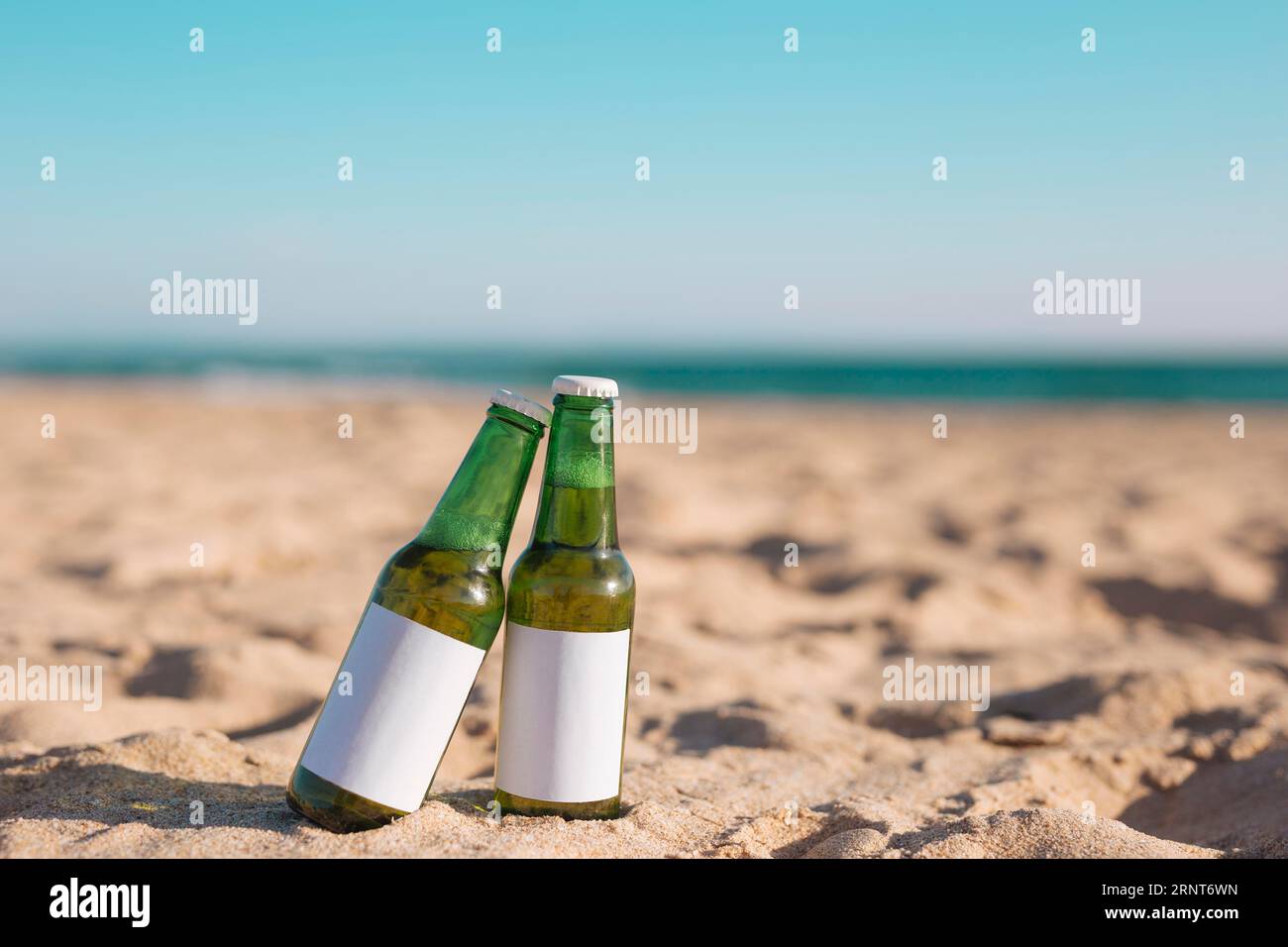 Two bottles beer sandy beach Stock Photo - Alamy Two bottles beer sandy beach Stock Photo - Alamy