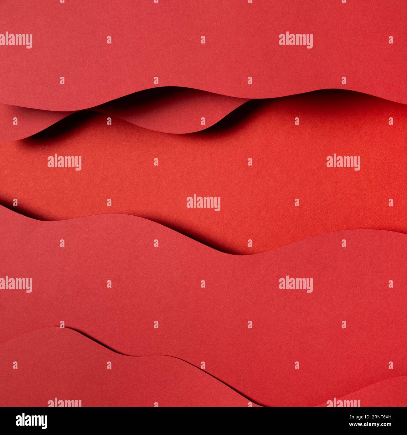 Wavy red layers paper Stock Photo - Alamy