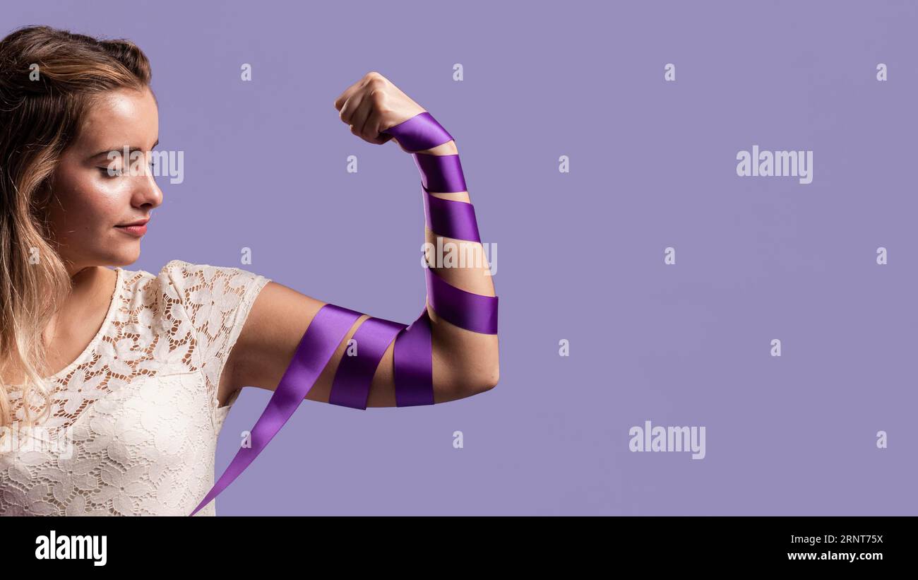 Woman flexing arm hi-res stock photography and images - Alamy