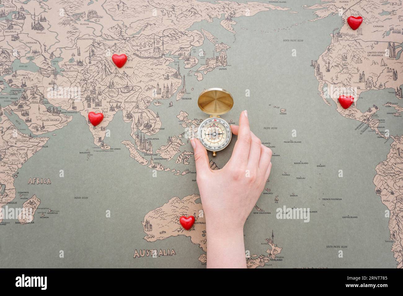 World map background with decorative hearts compass middle Stock Photo ...