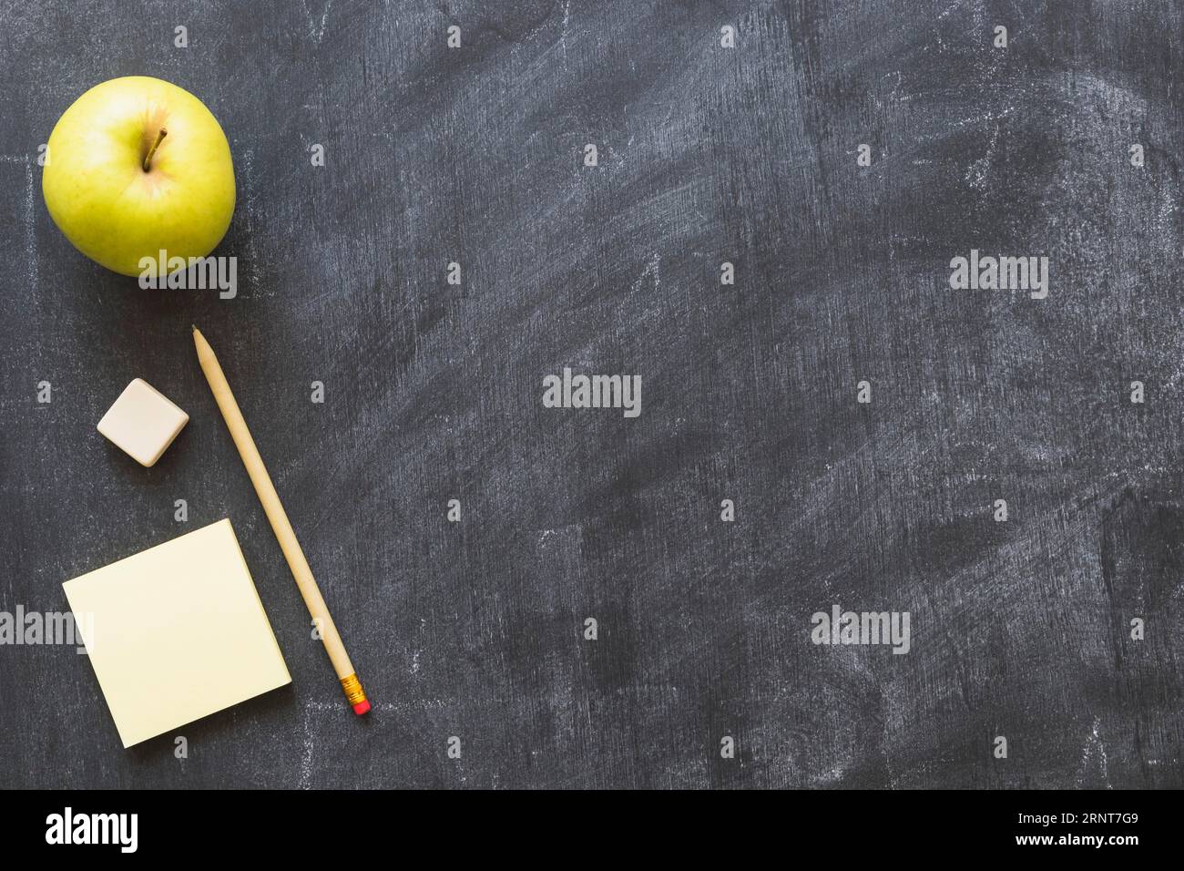 Blackboard with apple stationery Stock Photo - Alamy