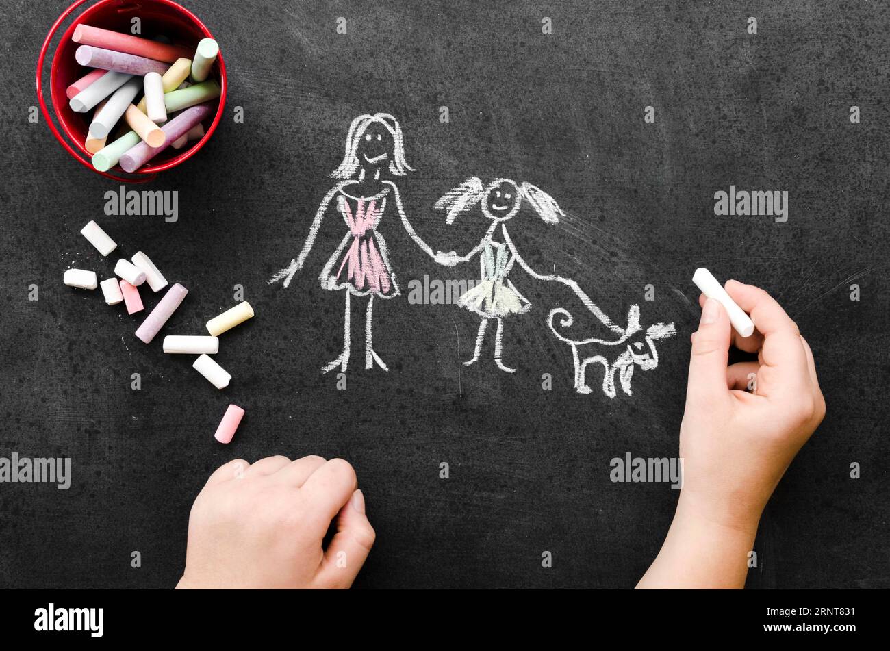 Chalk drawing with single mom Stock Photo - Alamy