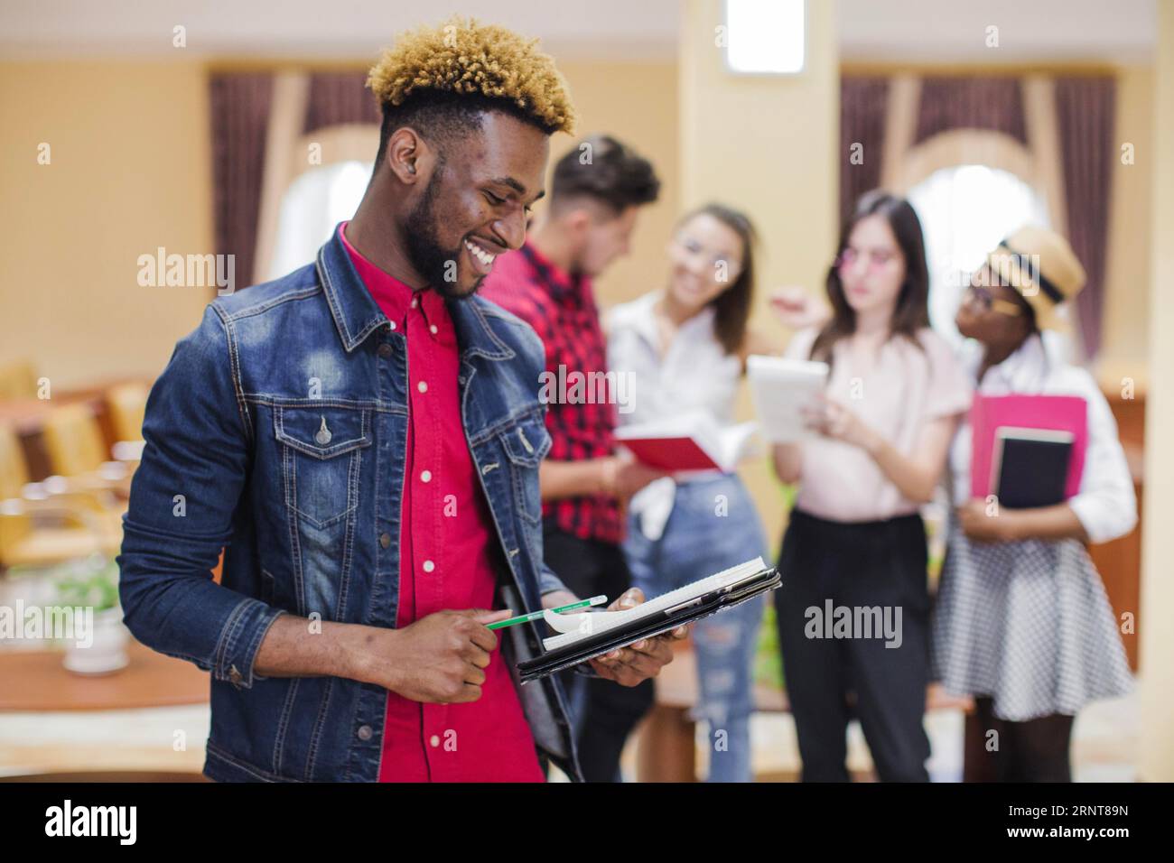 Posing with book hi-res stock photography and images - Alamy