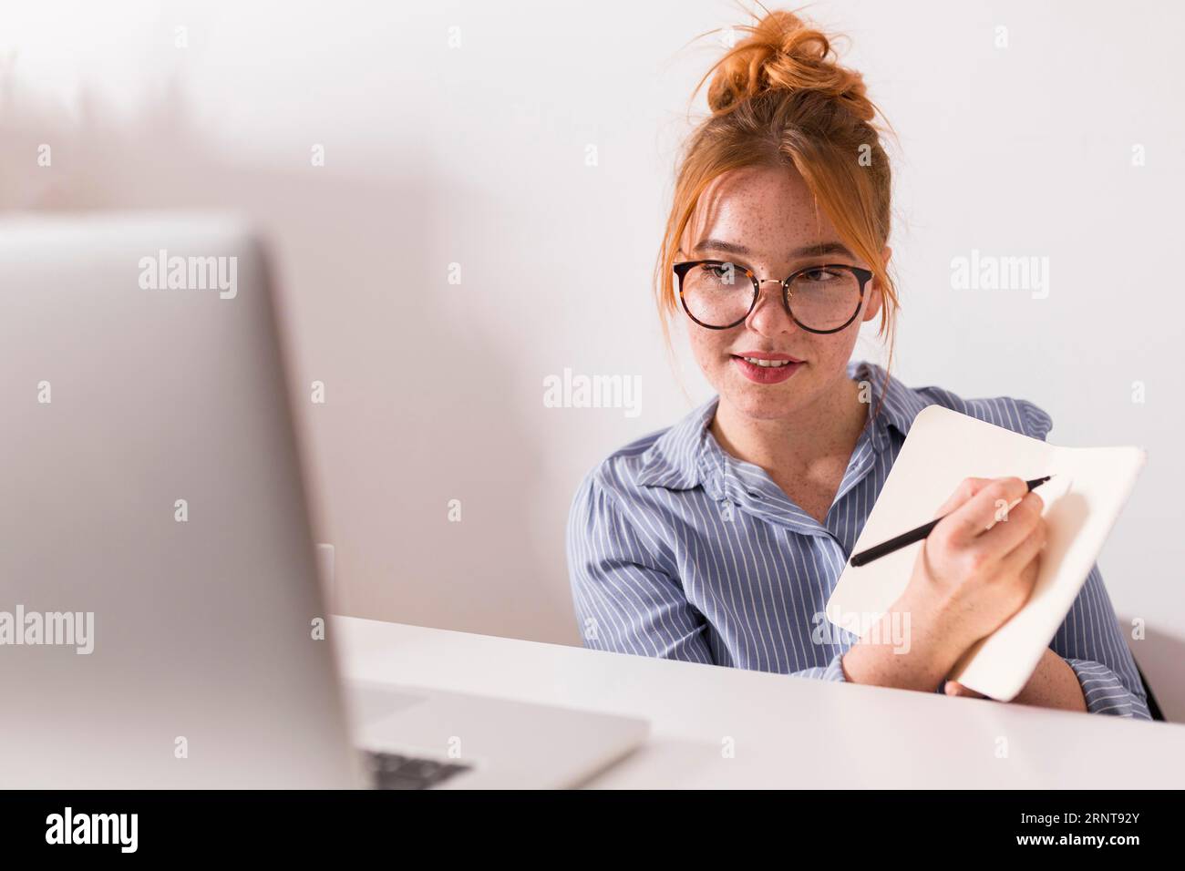 Female teacher explaining lesson during online class Stock Photo - Alamy