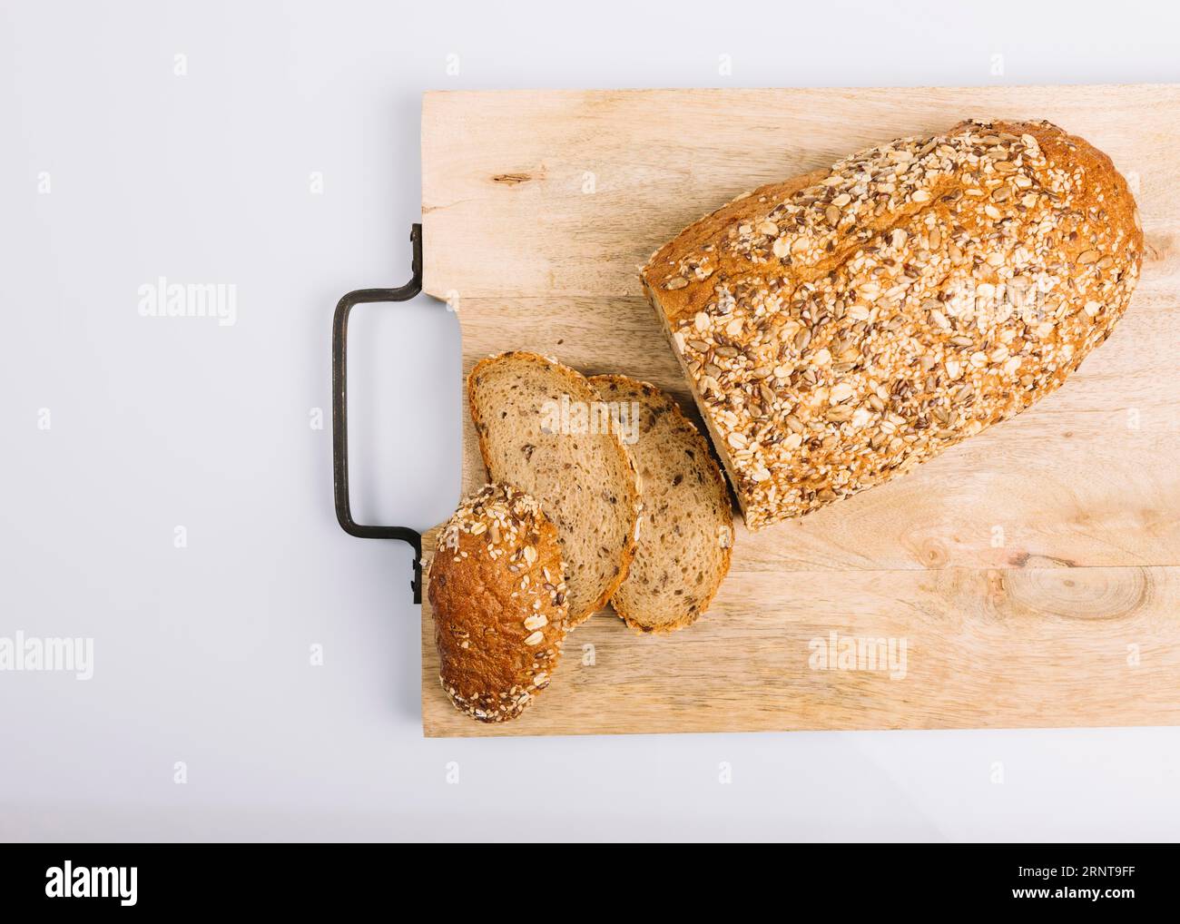 Top view sliced wholegrain bread chopping board white background Stock ...