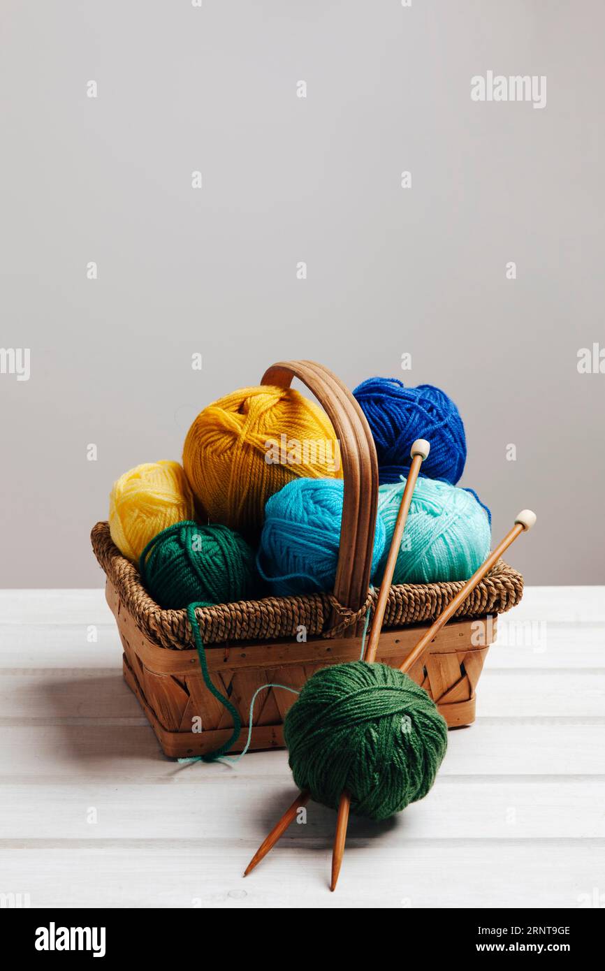 Various wool balls basket Stock Photo - Alamy