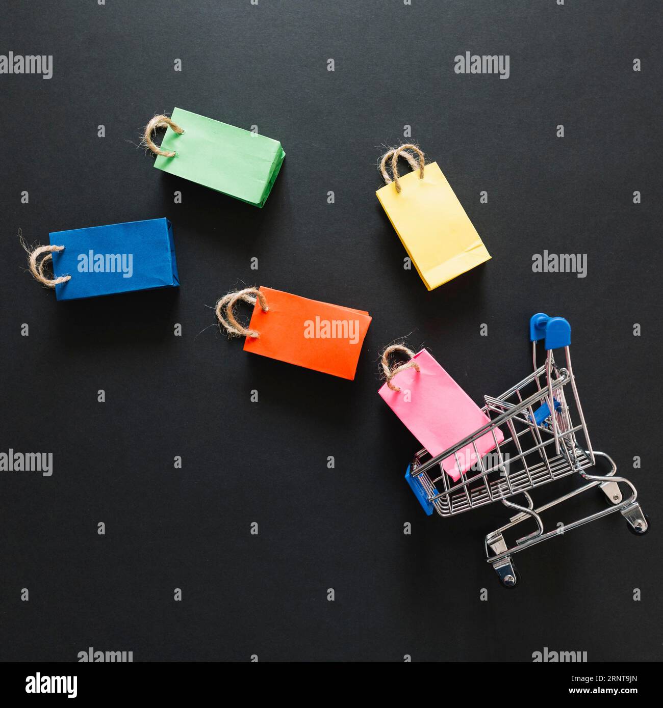 Toy supermarket cart with colourful packets Stock Photo - Alamy
