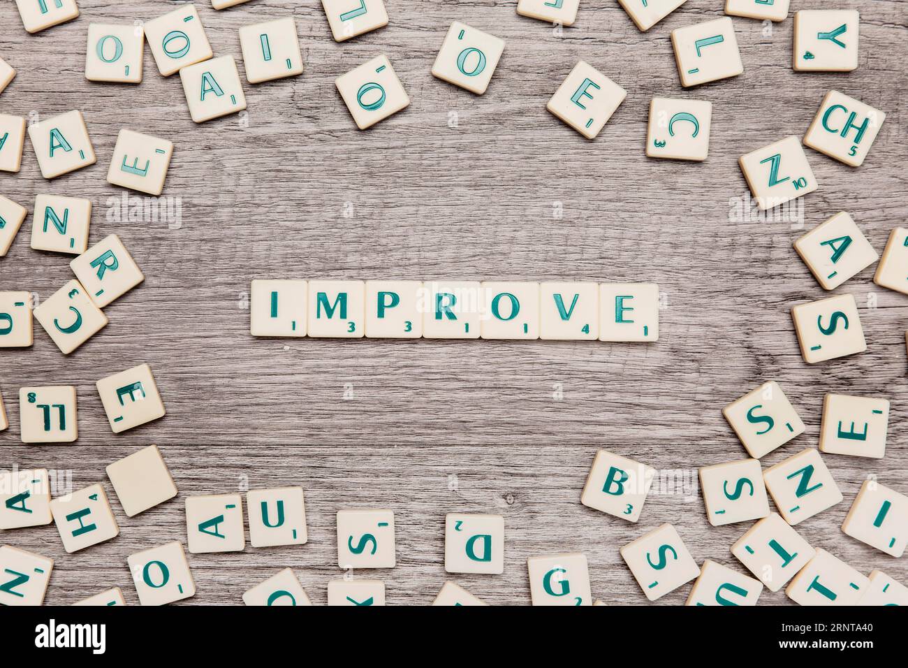 Letters forming word imrpove Stock Photo - Alamy