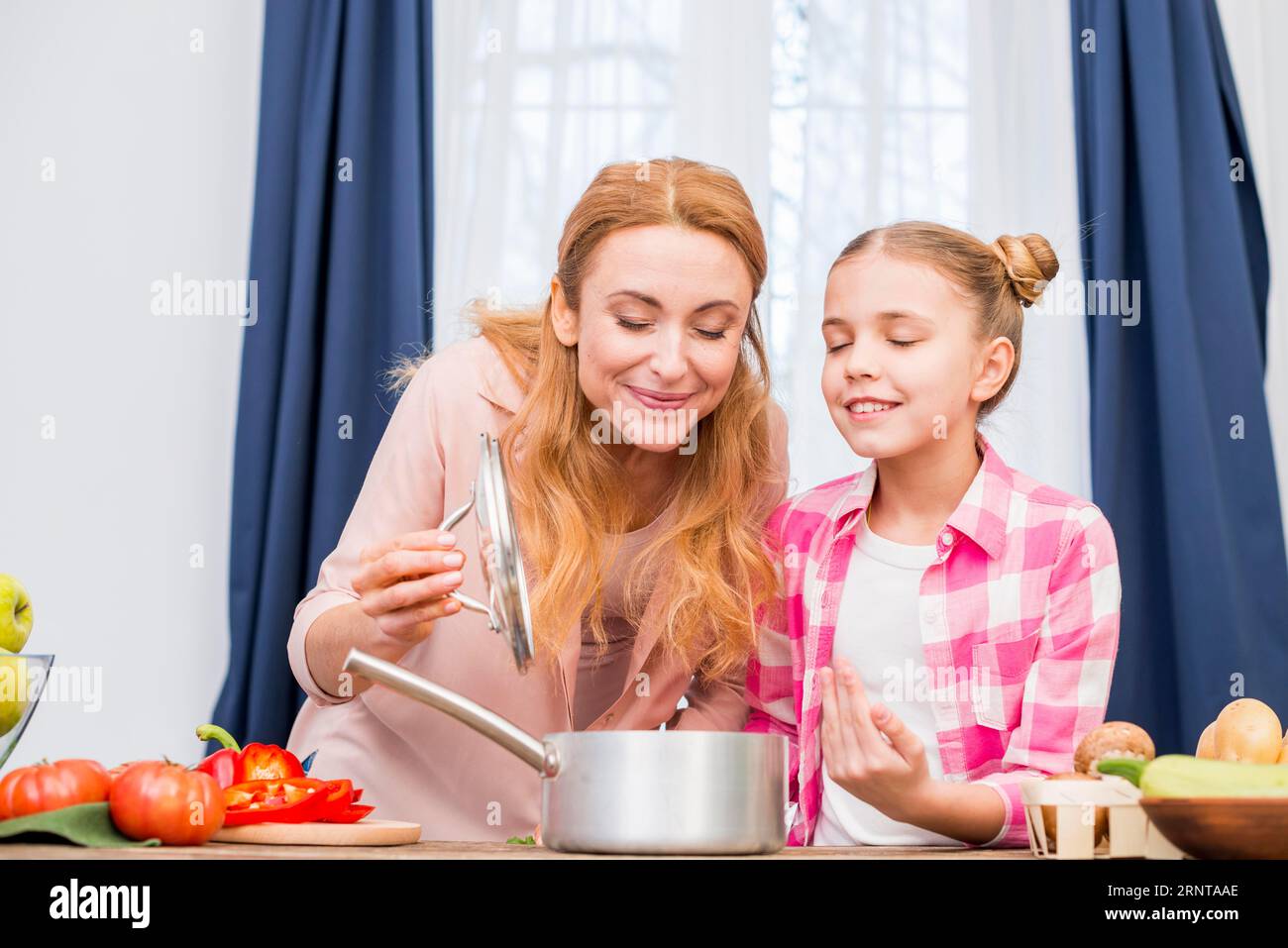 Mother smell food child hi-res stock photography and images - Alamy