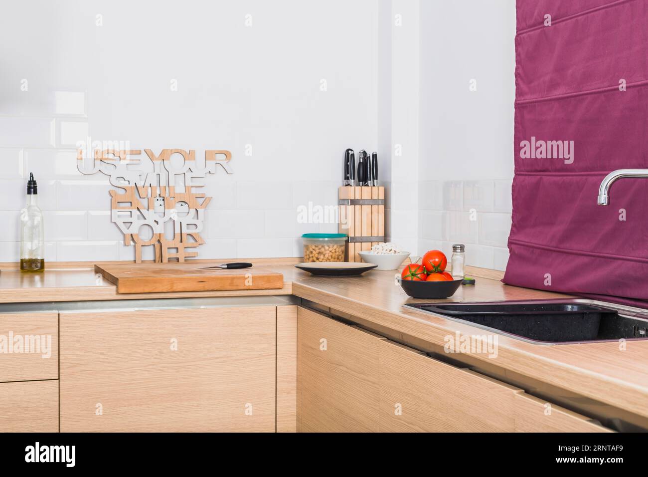 Nice kitchen corner table with products Stock Photo - Alamy