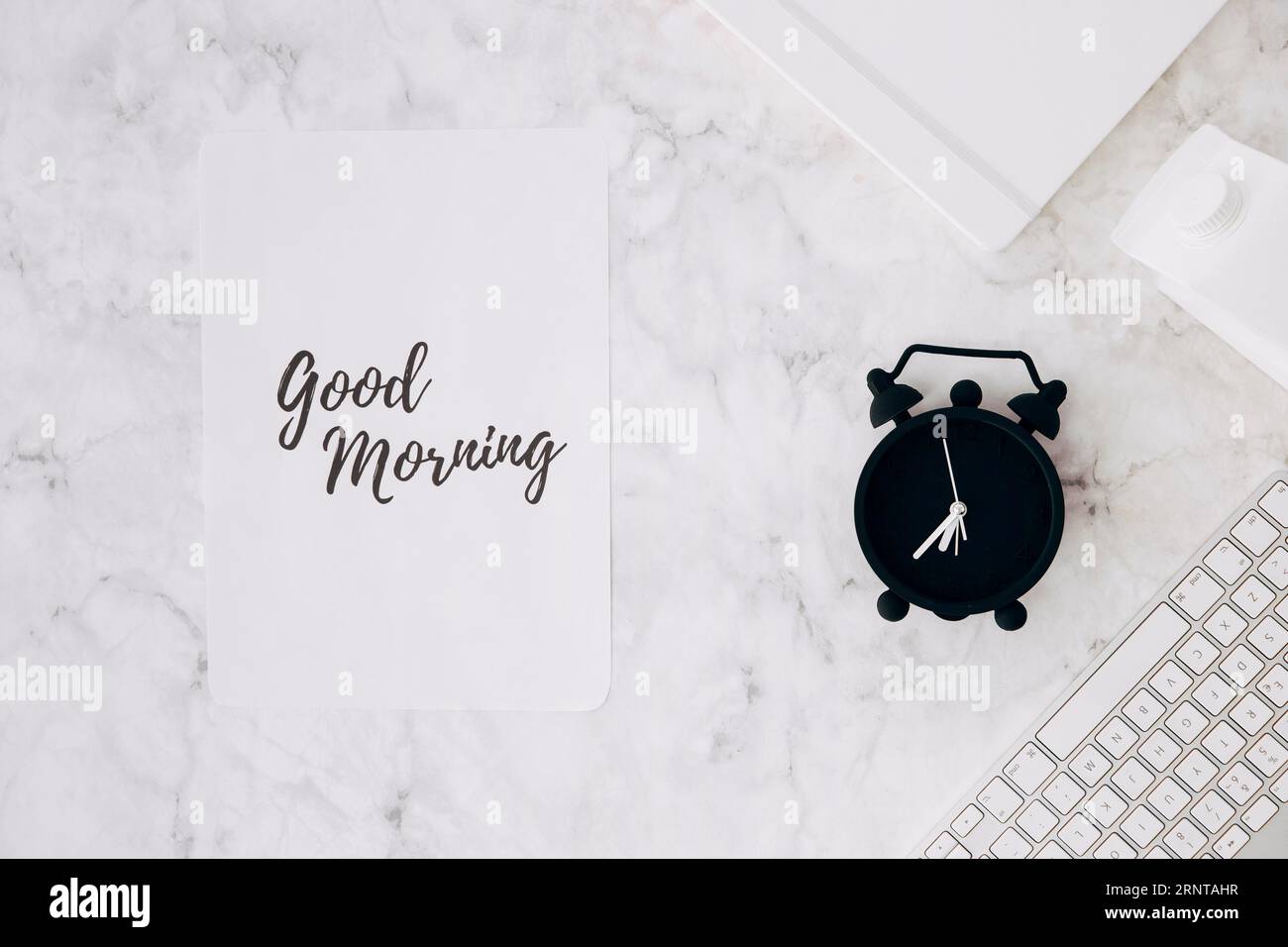 Paper with good morning text alarm clock diary milk carton keyboard ...