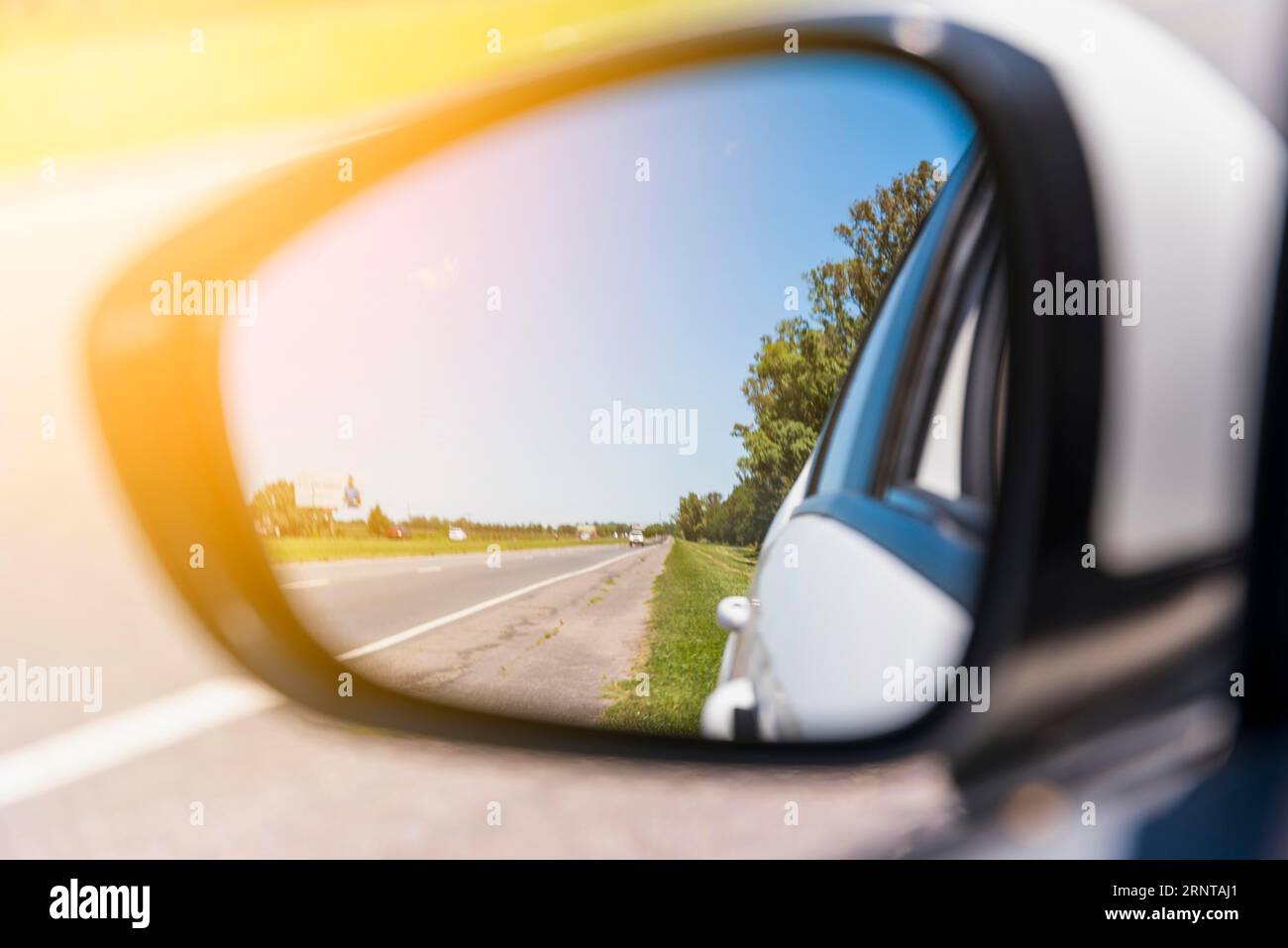 Road reflected side mirror Stock Photo - Alamy
