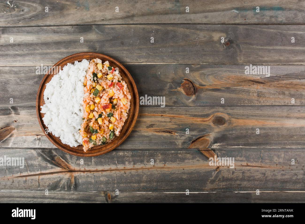 Plain white chinese fried rice wooden plate table Stock Photo - Alamy