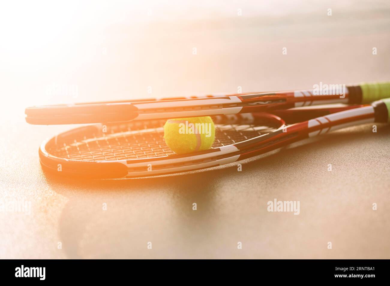 Tennis rackets with ball Stock Photo - Alamy