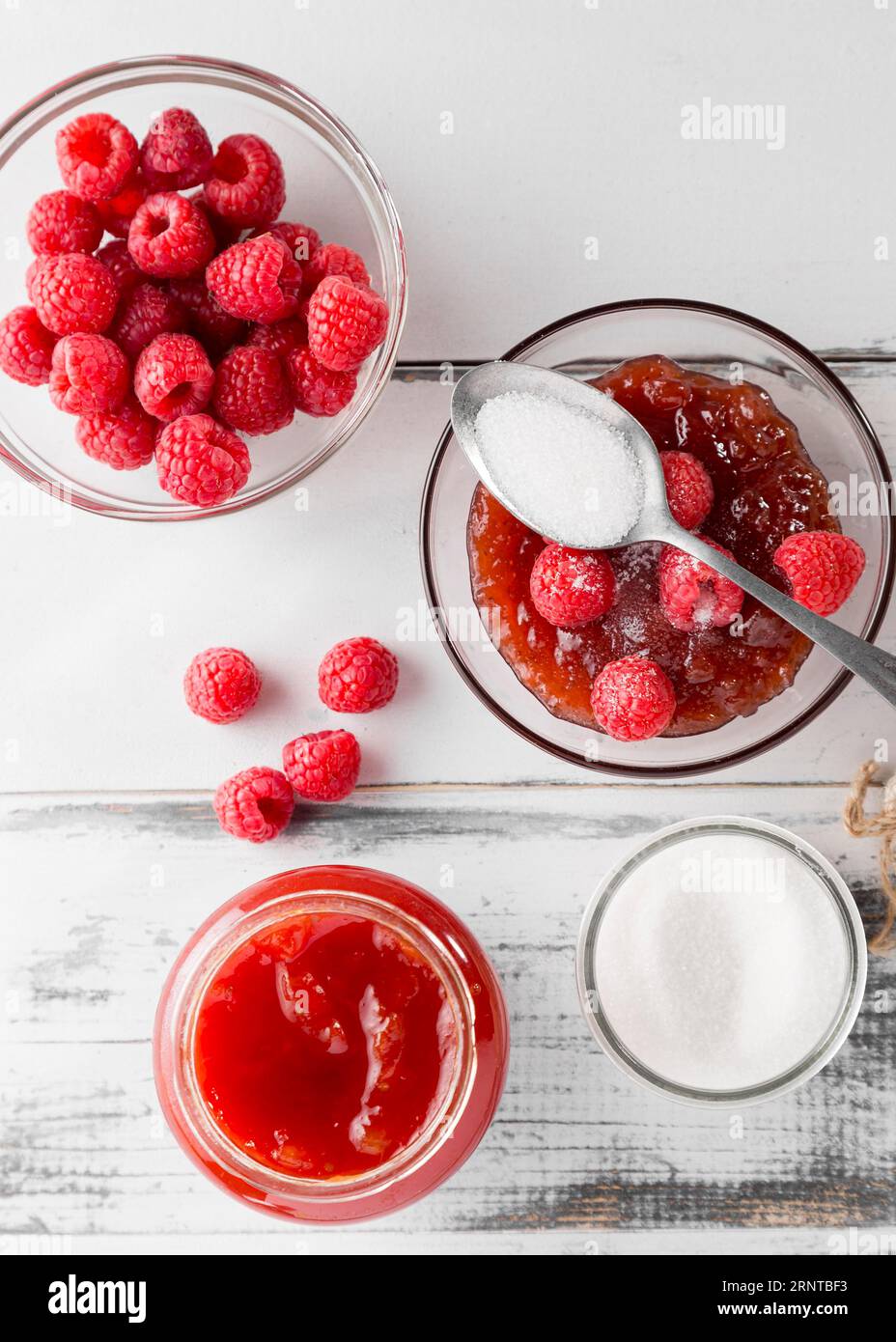 Top view glass jar with raspberry jam fruits Stock Photo - Alamy