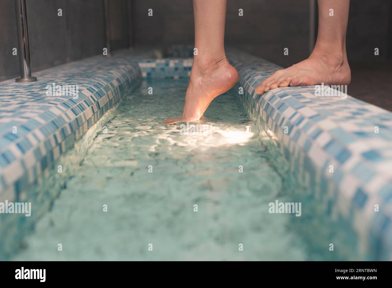Woman s feet edge bathtub Stock Photo - Alamy